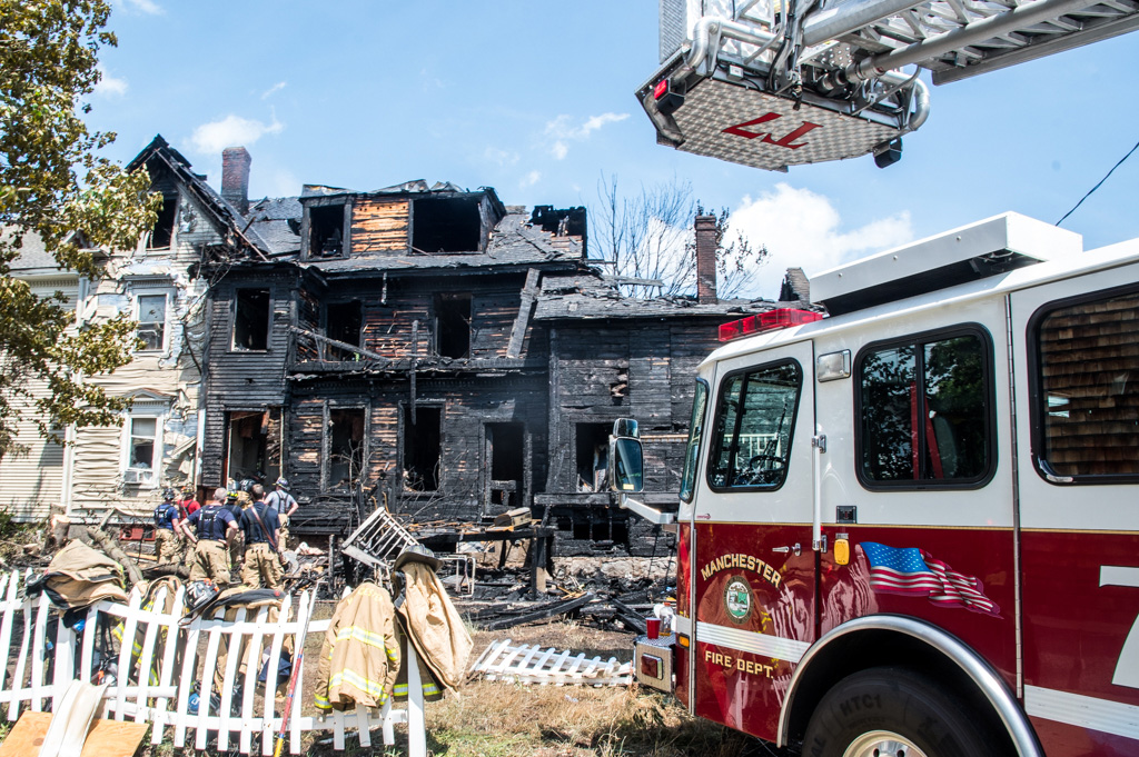 Multiple alarms sounded for Sunday morning tenement fire that spread to ...